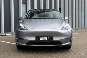 Grey Tesla Model Y 2023 in Vilnius, with an engine capacity of 0.00 L and mileage of 29 thousand km for 40900 €, photo 9 on AUTOMOTO.COM.LV