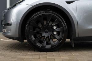 Grey Tesla Model Y 2023 in Vilnius, with an engine capacity of 0.00 L and mileage of 29 thousand km for 40900 €, photo 13 on AUTOMOTO.COM.LV