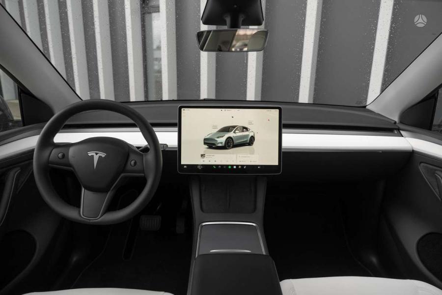 Grey Tesla Model Y 2023 in Vilnius, with an engine capacity of 0.00 L and mileage of 29 thousand km for 40900 €, photo 16 on AUTOMOTO.COM.LV