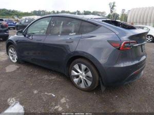 Grey Tesla Model Y 2023 in Klaipeda, with an engine capacity of 0.00 L and mileage of 35 thousand km for 20000 €, photo 6 on AUTOMOTO.COM.LV