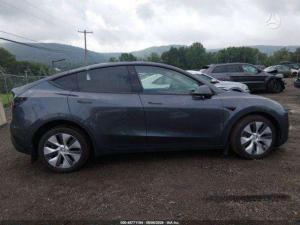 Grey Tesla Model Y 2023 in Klaipeda, with an engine capacity of 0.00 L and mileage of 35 thousand km for 20000 €, photo 9 on AUTOMOTO.COM.LV