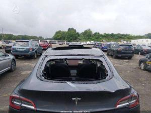 Grey Tesla Model Y 2023 in Klaipeda, with an engine capacity of 0.00 L and mileage of 35 thousand km for 20000 €, photo 11 on AUTOMOTO.COM.LV