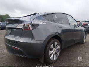 Grey Tesla Model Y 2023 in Klaipeda, with an engine capacity of 0.00 L and mileage of 35 thousand km for 20000 €, photo 12 on AUTOMOTO.COM.LV