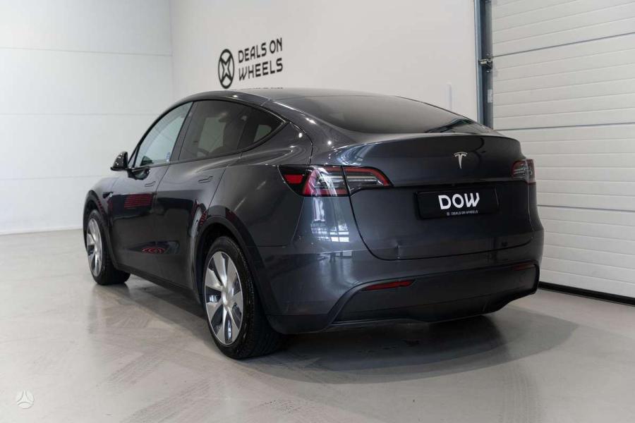 Grey Tesla Model Y 2023 in Vilnius, with an engine capacity of 0.00 L and mileage of 76 thousand km for 26500 €, photo 7 on AUTOMOTO.COM.LV
