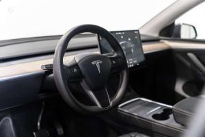 Grey Tesla Model Y 2023 in Vilnius, with an engine capacity of 0.00 L and mileage of 76 thousand km for 26500 €, photo 8 on AUTOMOTO.COM.LV