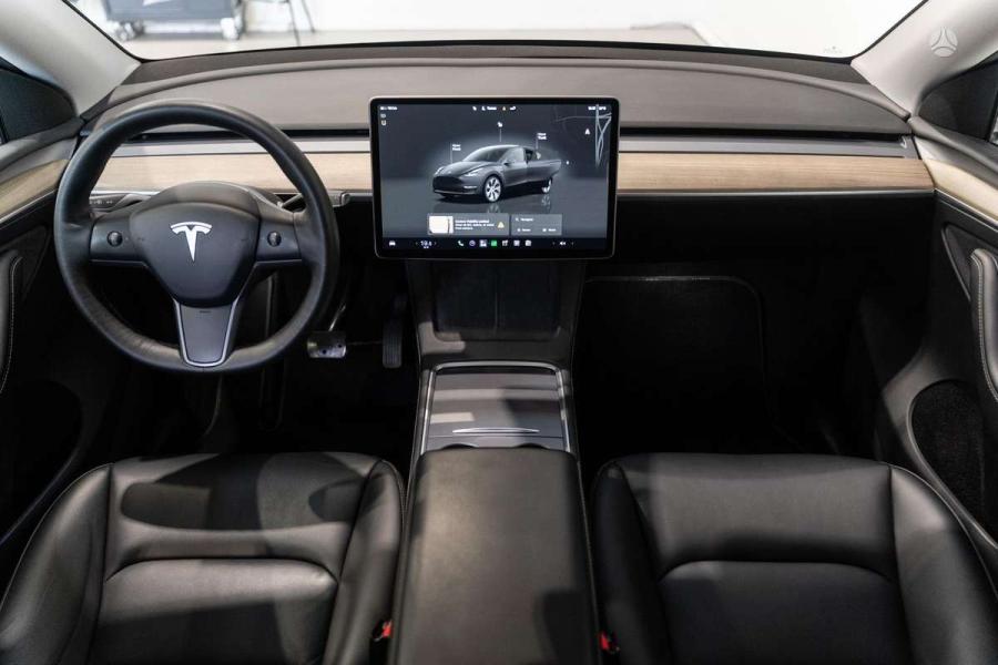 Grey Tesla Model Y 2023 in Vilnius, with an engine capacity of 0.00 L and mileage of 76 thousand km for 26500 €, photo 15 on AUTOMOTO.COM.LV