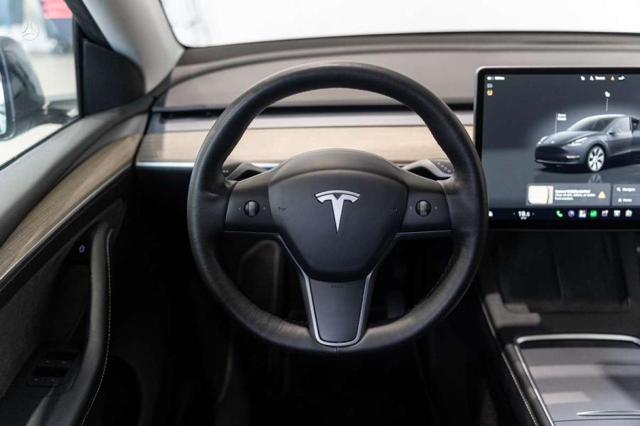 Grey Tesla Model Y 2023 in Vilnius, with an engine capacity of 0.00 L and mileage of 76 thousand km for 26500 €, photo 16 on AUTOMOTO.COM.LV