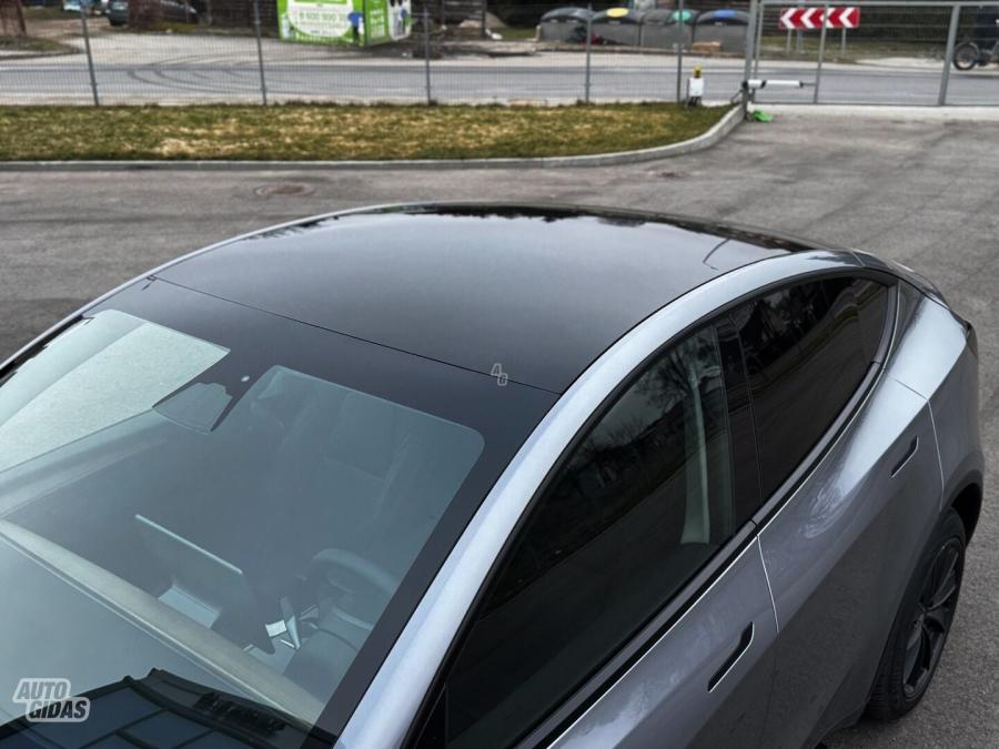 Grey Tesla Model Y 2024 in Klaipeda, with an engine capacity of 0.00 L and mileage of 17 thousand km for 37750 €, photo 9 on AUTOMOTO.COM.LV