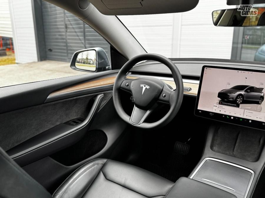 Grey Tesla Model Y 2024 in Klaipeda, with an engine capacity of 0.00 L and mileage of 17 thousand km for 37750 €, photo 17 on AUTOMOTO.COM.LV