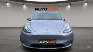 Grey Tesla Model Y 2024 in Vilnius, with an engine capacity of 0.00 L and mileage of 26 thousand km for 37666 €, photo 3 on AUTOMOTO.COM.LV