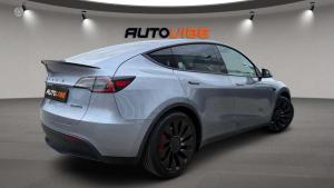 Grey Tesla Model Y 2024 in Vilnius, with an engine capacity of 0.00 L and mileage of 26 thousand km for 37666 €, photo 5 on AUTOMOTO.COM.LV
