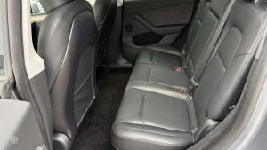 Grey Tesla Model Y 2024 in Vilnius, with an engine capacity of 0.00 L and mileage of 26 thousand km for 37666 €, photo 21 on AUTOMOTO.COM.LV