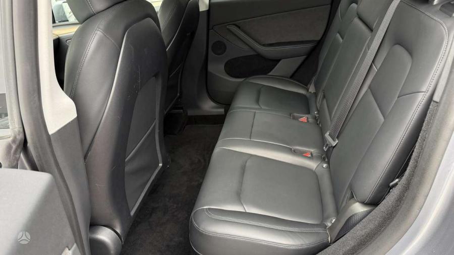 Grey Tesla Model Y 2024 in Vilnius, with an engine capacity of 0.00 L and mileage of 26 thousand km for 37666 €, photo 21 on AUTOMOTO.COM.LV