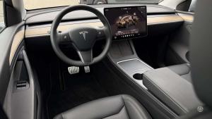 Grey Tesla Model Y 2024 in Vilnius, with an engine capacity of 0.00 L and mileage of 26 thousand km for 37666 €, photo 22 on AUTOMOTO.COM.LV