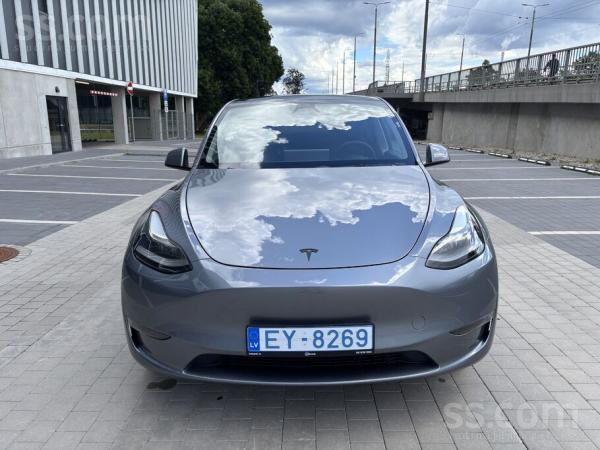 Grey Tesla Model Y 2024 in Riga, with an engine capacity of 0.00 L and mileage of 14 thousand km for 40900 €, photo 7 on AUTOMOTO.COM.LV