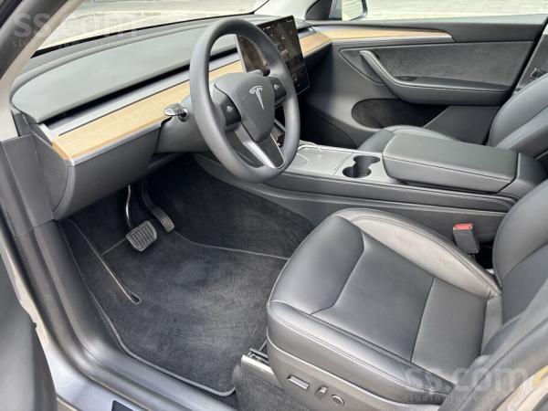 Grey Tesla Model Y 2024 in Riga, with an engine capacity of 0.00 L and mileage of 14 thousand km for 40900 €, photo 9 on AUTOMOTO.COM.LV