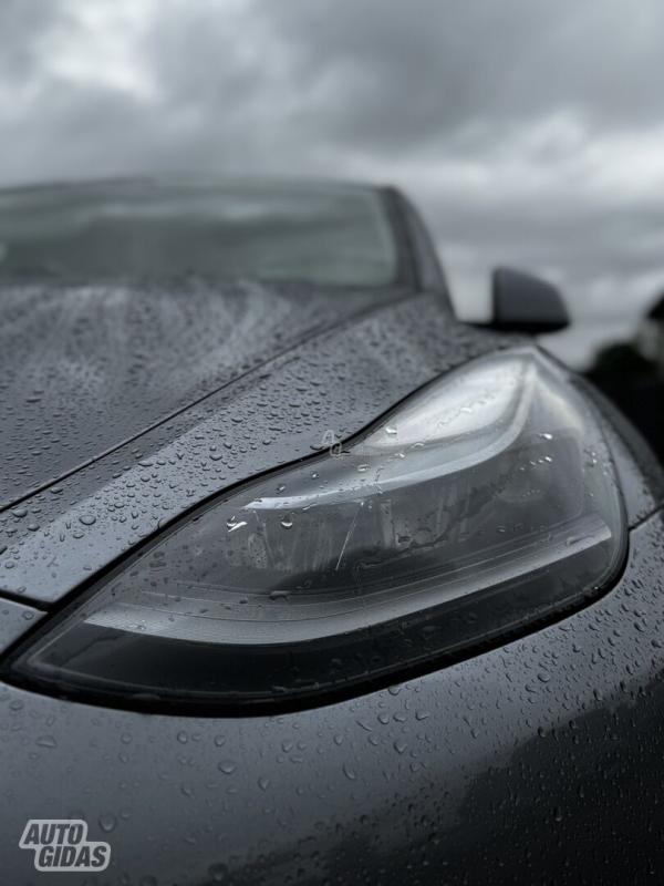 Grey Tesla Model Y 2024 in Klaipeda, with an engine capacity of 0.00 L and mileage of 21 thousand km for 37500 €, photo 3 on AUTOMOTO.COM.LV