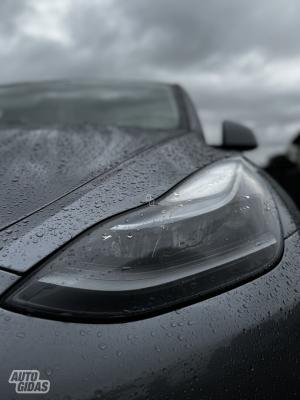 Grey Tesla Model Y 2024 in Klaipeda, with an engine capacity of 0.00 L and mileage of 21 thousand km for 37500 €, photo 4 on AUTOMOTO.COM.LV