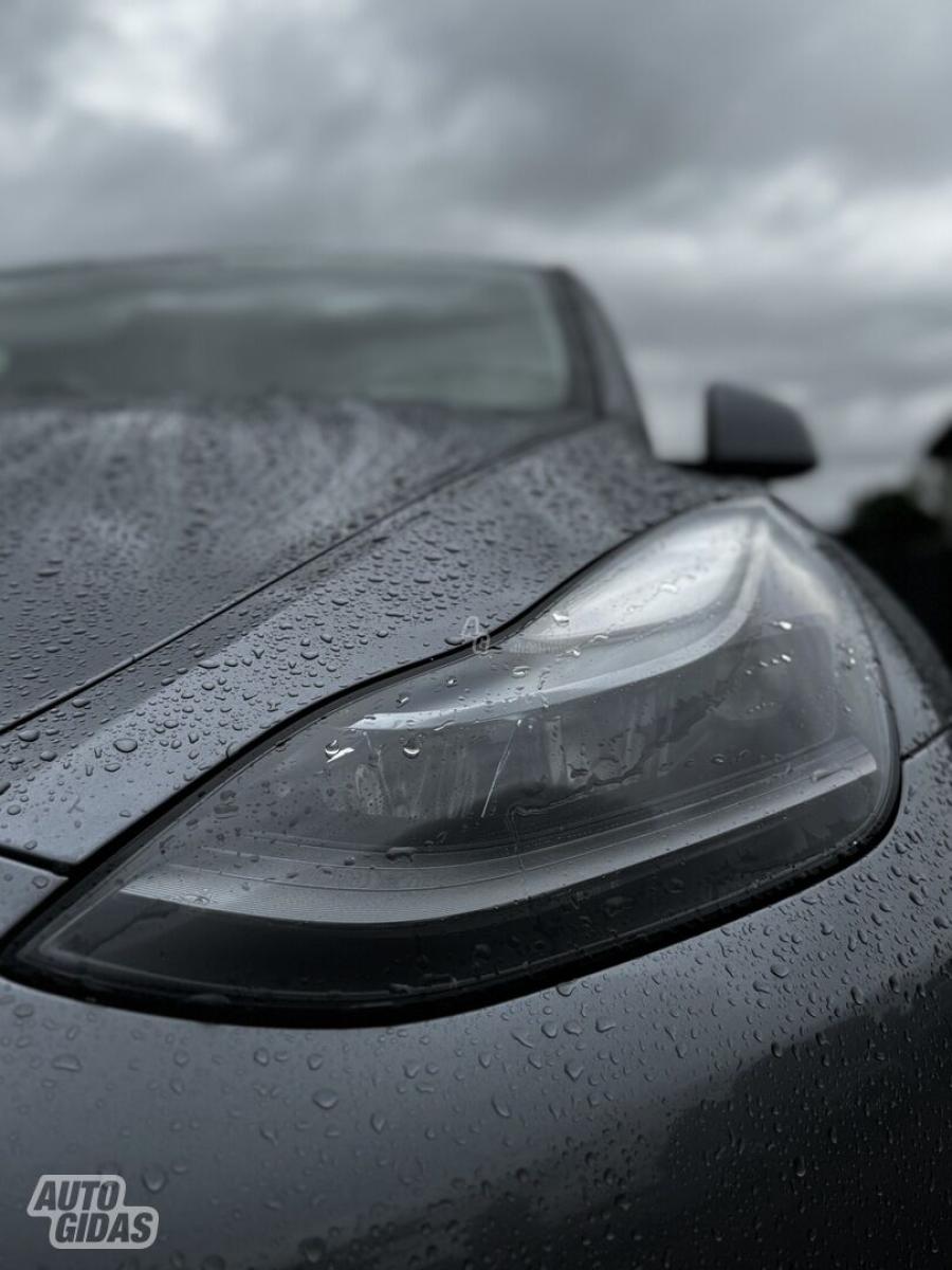 Grey Tesla Model Y 2024 in Klaipeda, with an engine capacity of 0.00 L and mileage of 21 thousand km for 37500 €, photo 4 on AUTOMOTO.COM.LV