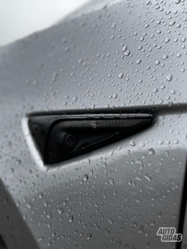 Grey Tesla Model Y 2024 in Klaipeda, with an engine capacity of 0.00 L and mileage of 21 thousand km for 37500 €, photo 5 on AUTOMOTO.COM.LV