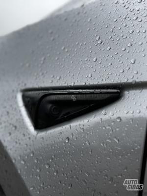 Grey Tesla Model Y 2024 in Klaipeda, with an engine capacity of 0.00 L and mileage of 21 thousand km for 37500 €, photo 6 on AUTOMOTO.COM.LV
