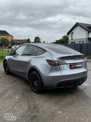 Grey Tesla Model Y 2024 in Klaipeda, with an engine capacity of 0.00 L and mileage of 21 thousand km for 37500 €, photo 8 on AUTOMOTO.COM.LV
