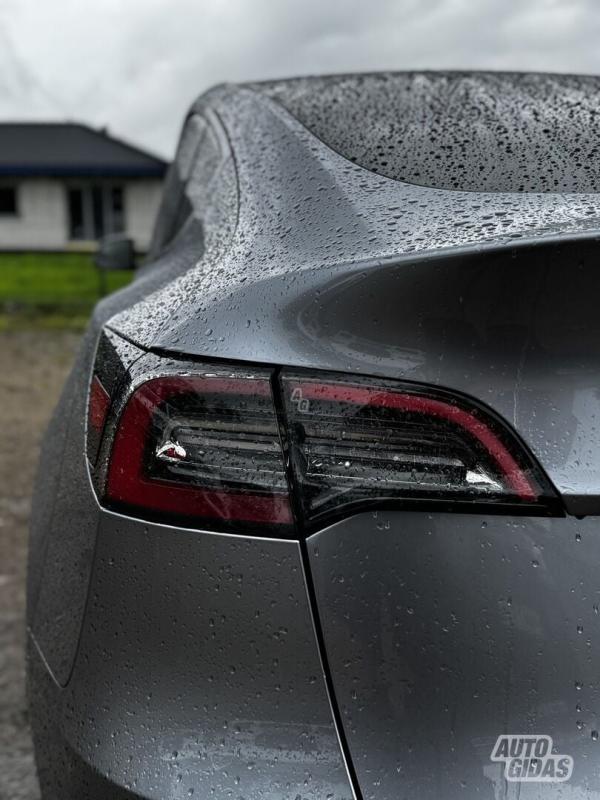 Grey Tesla Model Y 2024 in Klaipeda, with an engine capacity of 0.00 L and mileage of 21 thousand km for 37500 €, photo 9 on AUTOMOTO.COM.LV