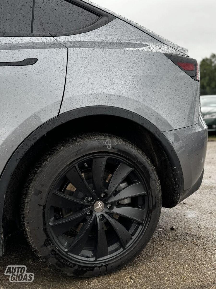 Grey Tesla Model Y 2024 in Klaipeda, with an engine capacity of 0.00 L and mileage of 21 thousand km for 37500 €, photo 11 on AUTOMOTO.COM.LV