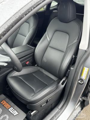 Grey Tesla Model Y 2024 in Klaipeda, with an engine capacity of 0.00 L and mileage of 21 thousand km for 37500 €, photo 15 on AUTOMOTO.COM.LV