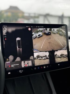 Grey Tesla Model Y 2024 in Klaipeda, with an engine capacity of 0.00 L and mileage of 21 thousand km for 37500 €, photo 20 on AUTOMOTO.COM.LV