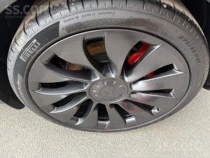 Grey Tesla Model Y 2024 in Riga, with an engine capacity of 0.00 L and mileage of 68 thousand km for 39600 €, photo 11 on AUTOMOTO.COM.LV
