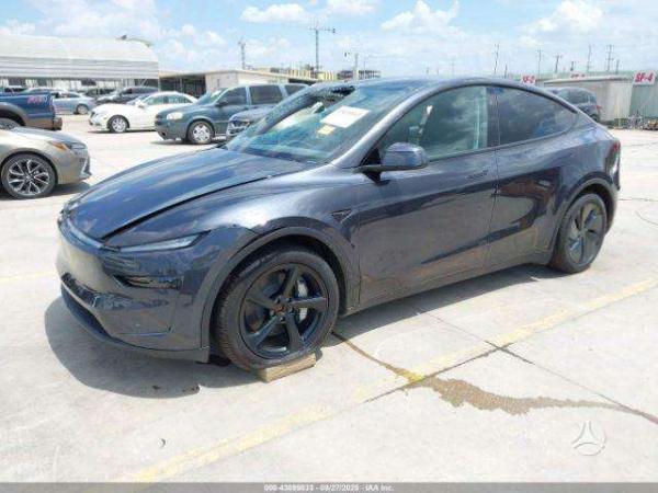 Grey Tesla Model Y 2025 in Klaipeda, with an engine capacity of 0.00 L and mileage of 2 thousand km for 23800 €, photo 1 on AUTOMOTO.COM.LV
