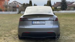 Grey Tesla Model Y 2025 in Riga, with an engine capacity of 0.00 L and mileage of 18 thousand km for 49500 €, photo 7 on AUTOMOTO.COM.LV