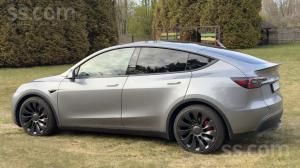 Grey Tesla Model Y 2025 in Riga, with an engine capacity of 0.00 L and mileage of 18 thousand km for 49500 €, photo 8 on AUTOMOTO.COM.LV