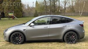 Grey Tesla Model Y 2025 in Riga, with an engine capacity of 0.00 L and mileage of 18 thousand km for 49500 €, photo 9 on AUTOMOTO.COM.LV