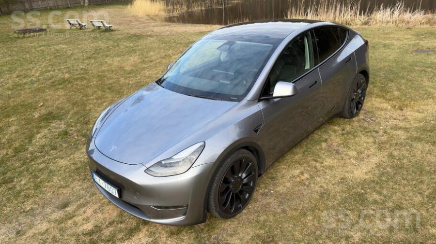 Grey Tesla Model Y 2025 in Riga, with an engine capacity of 0.00 L and mileage of 18 thousand km for 49500 €, photo 10 on AUTOMOTO.COM.LV