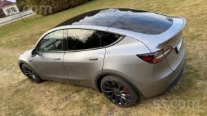 Grey Tesla Model Y 2025 in Riga, with an engine capacity of 0.00 L and mileage of 18 thousand km for 49500 €, photo 11 on AUTOMOTO.COM.LV