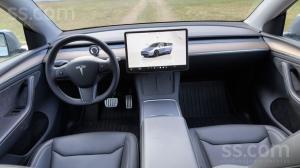 Grey Tesla Model Y 2025 in Riga, with an engine capacity of 0.00 L and mileage of 18 thousand km for 49500 €, photo 12 on AUTOMOTO.COM.LV