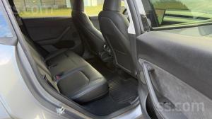 Grey Tesla Model Y 2025 in Riga, with an engine capacity of 0.00 L and mileage of 18 thousand km for 49500 €, photo 18 on AUTOMOTO.COM.LV