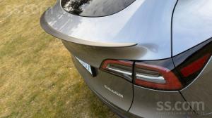 Grey Tesla Model Y 2025 in Riga, with an engine capacity of 0.00 L and mileage of 18 thousand km for 49500 €, photo 19 on AUTOMOTO.COM.LV