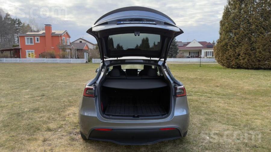 Grey Tesla Model Y 2025 in Riga, with an engine capacity of 0.00 L and mileage of 18 thousand km for 49500 €, photo 20 on AUTOMOTO.COM.LV