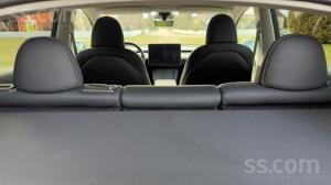 Grey Tesla Model Y 2025 in Riga, with an engine capacity of 0.00 L and mileage of 18 thousand km for 49500 €, photo 23 on AUTOMOTO.COM.LV