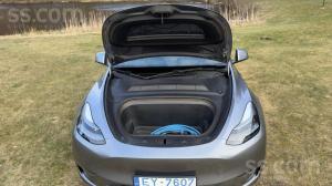 Grey Tesla Model Y 2025 in Riga, with an engine capacity of 0.00 L and mileage of 18 thousand km for 49500 €, photo 30 on AUTOMOTO.COM.LV