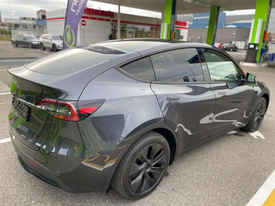Grey Tesla Model Y 2025 in Vilnius, with an engine capacity of 0.00 L and mileage of 13 thousand km for 28800 €, photo 13 on AUTOMOTO.COM.LV