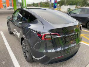 Grey Tesla Model Y 2025 in Vilnius, with an engine capacity of 0.00 L and mileage of 13 thousand km for 28800 €, photo 14 on AUTOMOTO.COM.LV