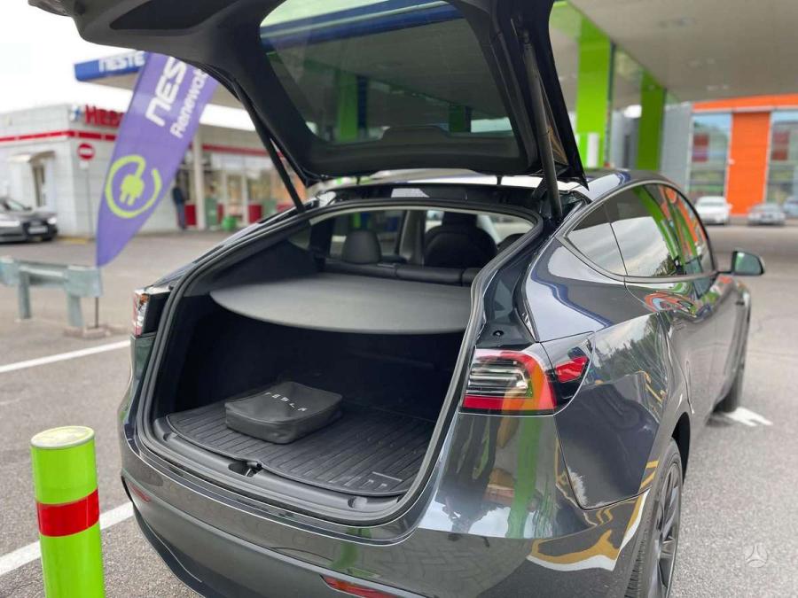 Grey Tesla Model Y 2025 in Vilnius, with an engine capacity of 0.00 L and mileage of 13 thousand km for 28800 €, photo 15 on AUTOMOTO.COM.LV