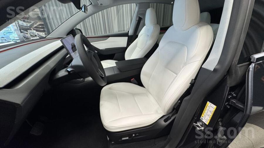 Grey Tesla Model Y 2026 in Riga, with an engine capacity of 0.00 L and mileage of 6 thousand km for 49990 €, photo 17 on AUTOMOTO.COM.LV
