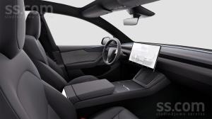Grey Tesla Model Y 2026 in Riga, with an engine capacity of 0.00 L and mileage of 0 thousand km for 66990 €, photo 4 on AUTOMOTO.COM.LV
