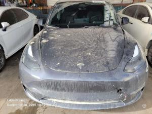 Grey Tesla Model Y 2017 in Vilnius, with an engine capacity of 0.00 L and mileage of 126 thousand km for 17400 €, photo  on AUTOMOTO.COM.LV