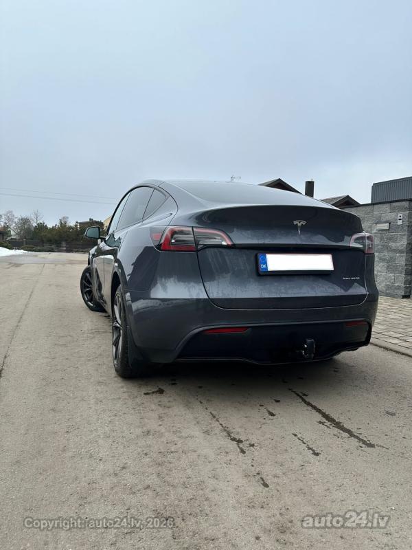 Grey Tesla Model Y 2021 in Parnu, with an engine capacity of 0.00 L and mileage of 138 thousand km for 24990 €, photo 6 on AUTOMOTO.COM.LV